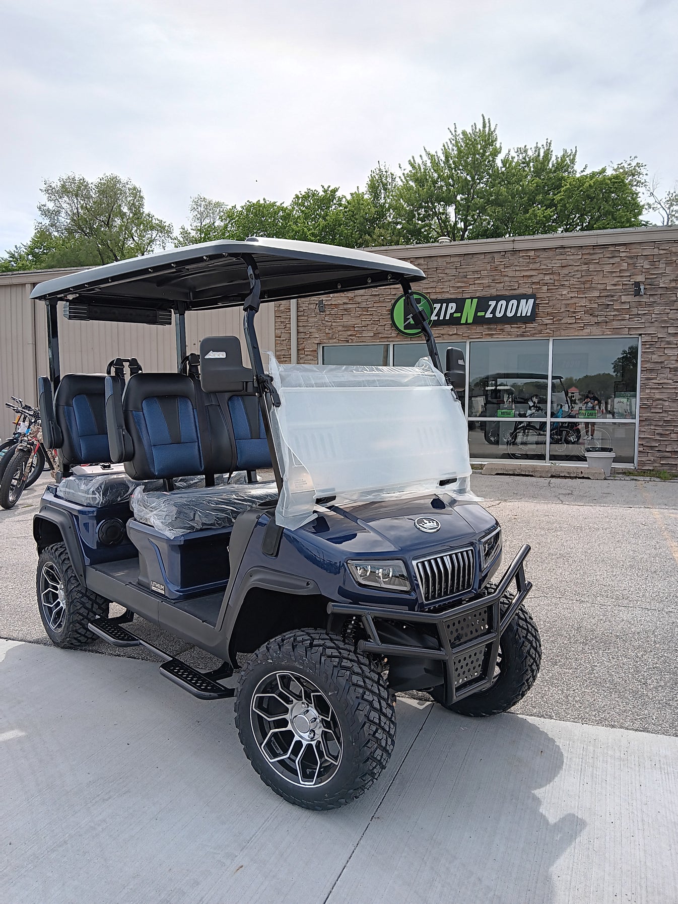 Evolution | Lifted 4-Seater Maverick Blue Golf Cart in Des Moines – E ...