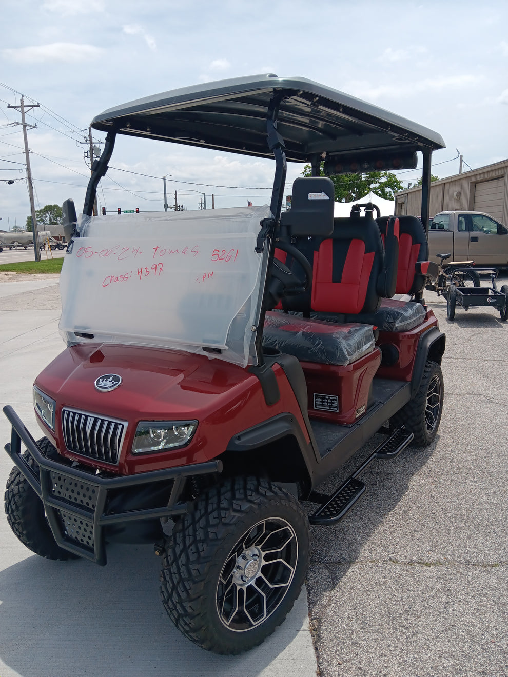 Evolution | Lifted 4-Seater Maverick Flamenco Red Golf Cart LSV – E Zip ...